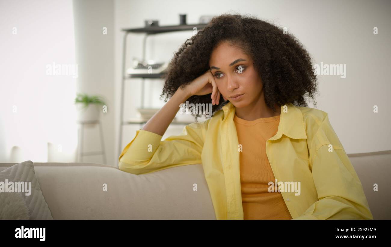 Sad pensive depressed African American ethnic woman upset thoughtful ...
