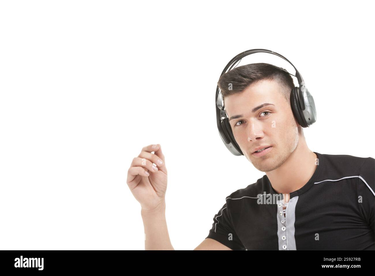 Young men feeling the music in front of a white background Stock Photo ...