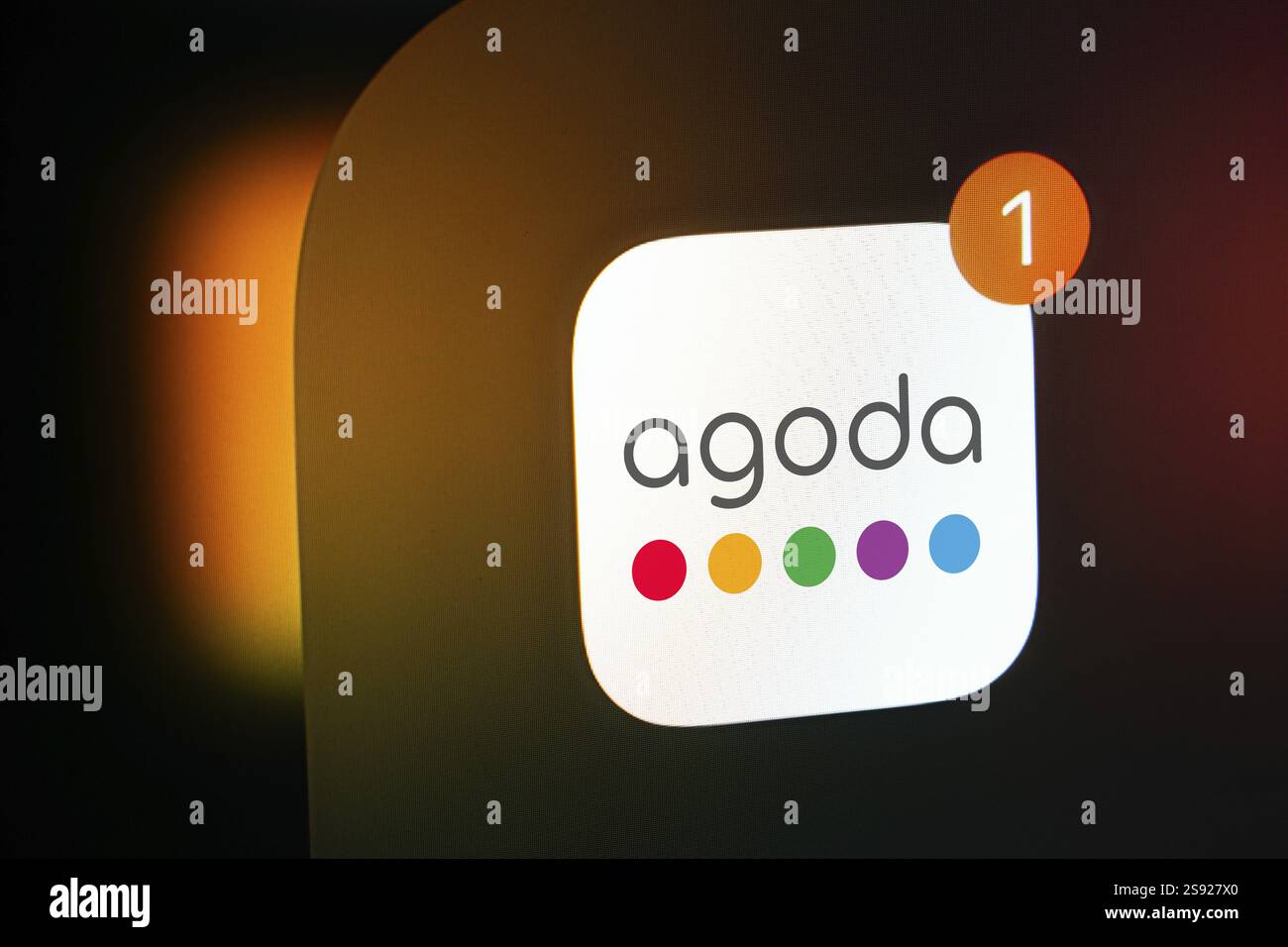 Dhaka, Bangladesh- 21 jan 2025: A close up of an iPhone screen displaying the Agoda logo. Agoda ...