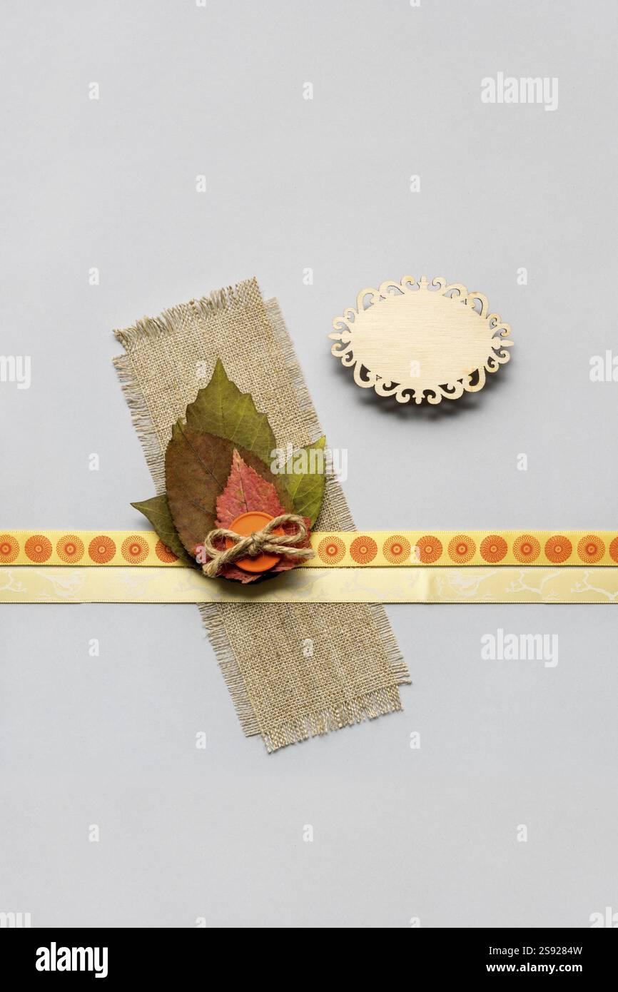 Creative Thanksgiving Day concept photo of leaves on grey background ...
