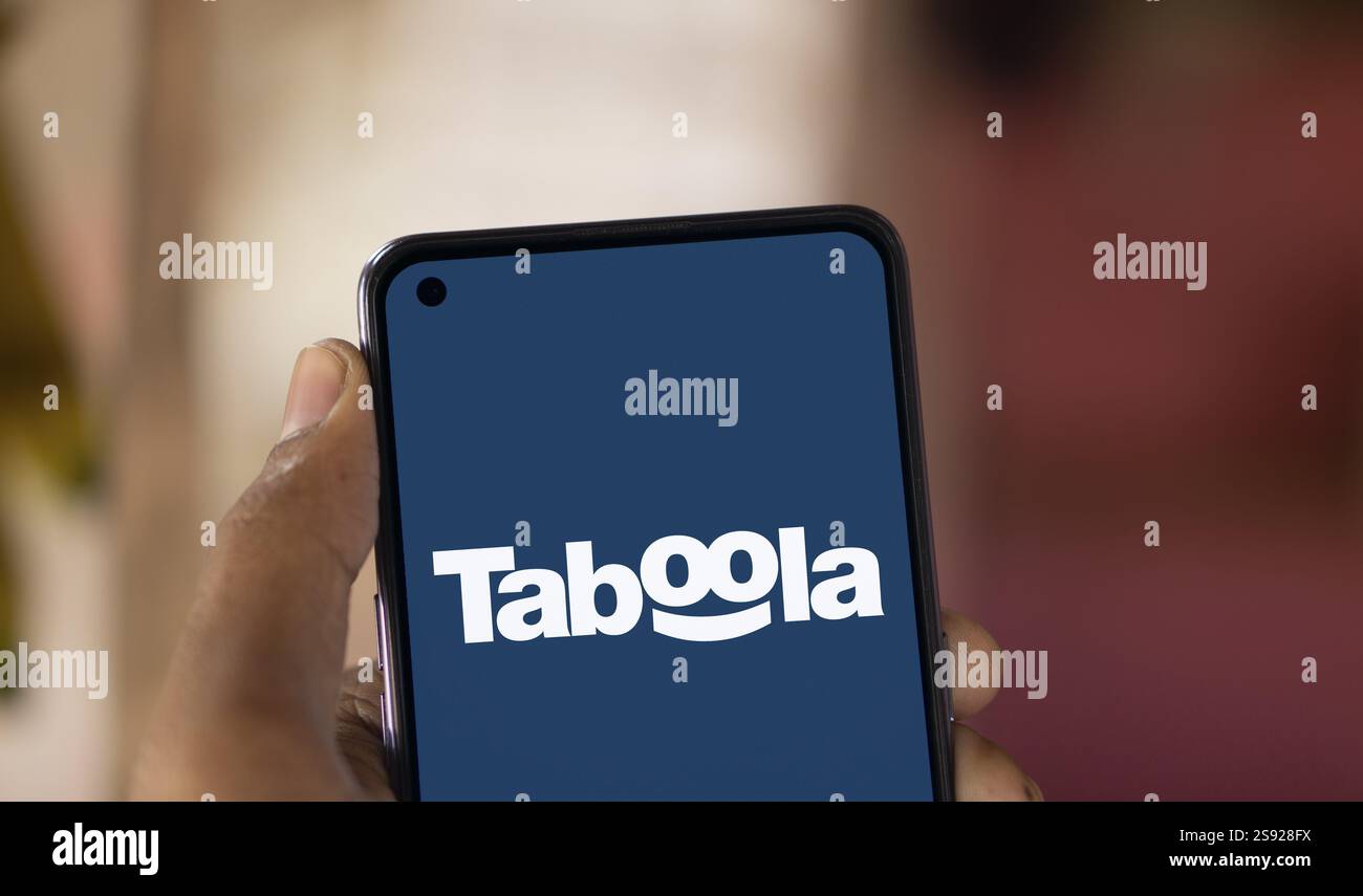 Dhaka, Bangladesh- 19 Jan 2025: taboola logo is displayed on smartphone. Taboola Inc is a ...