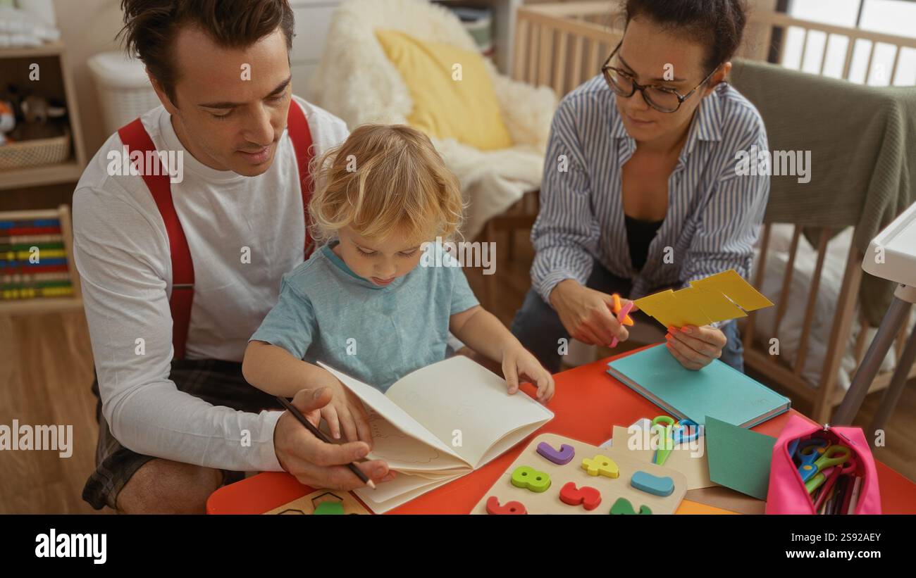 Parents teaching child at home, with man, woman, and boy engaged in ...