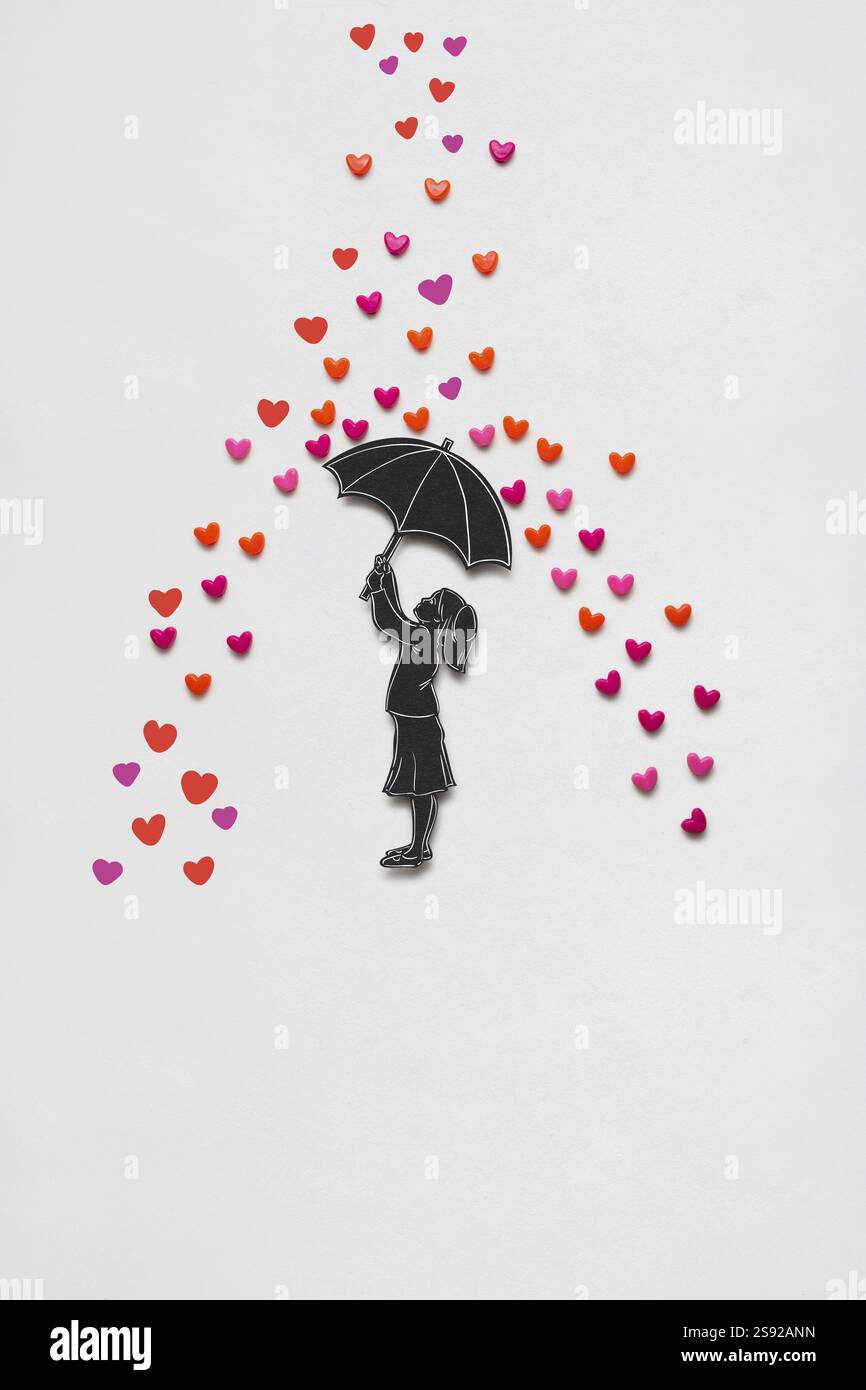 Creative valentines concept photo of a girl with umbrella and rain ...