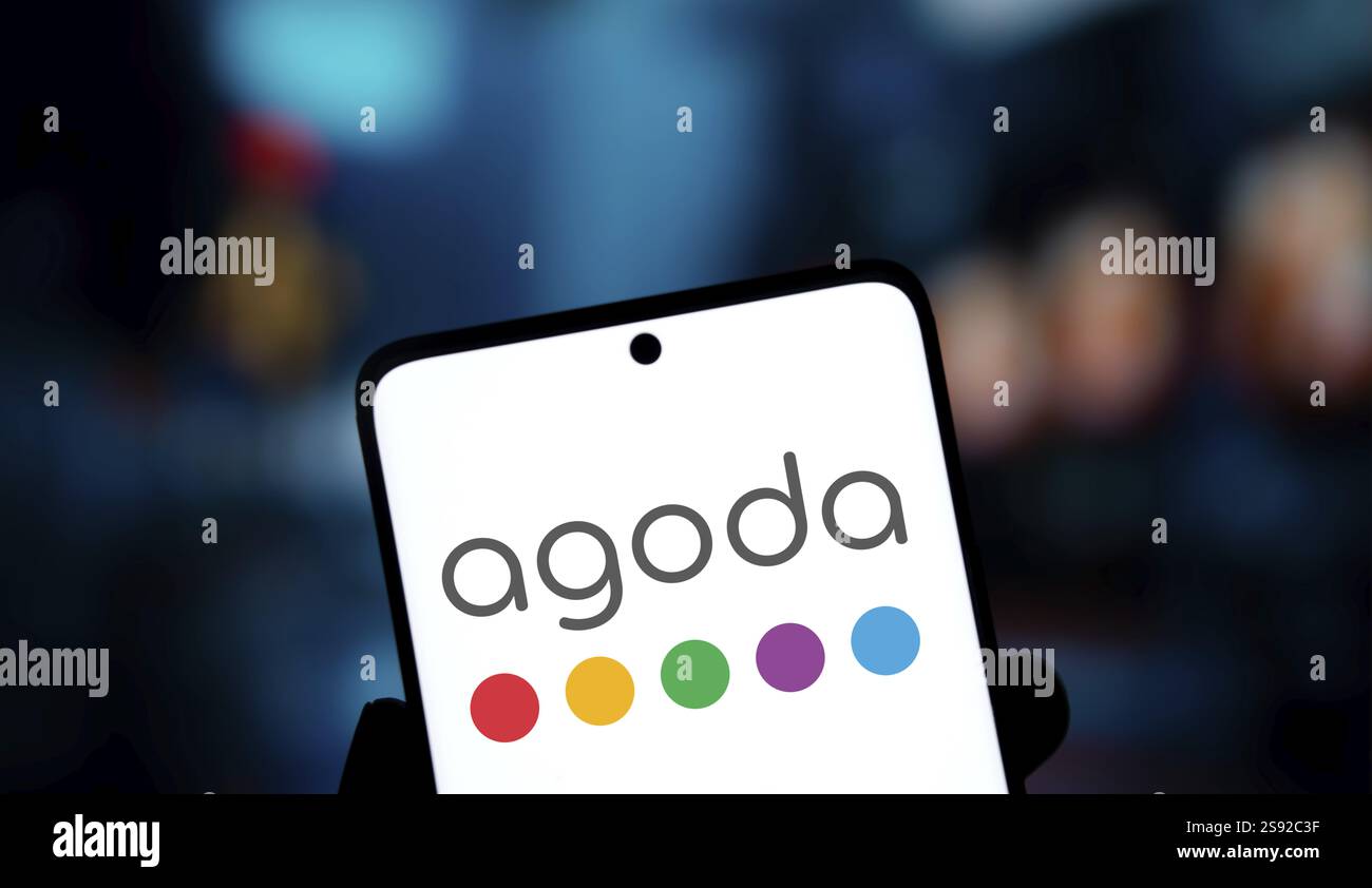 Dhaka, Bangladesh- 21 jan 2025: Agoda logo is displayed on smartphone. Agoda is an online travel ...