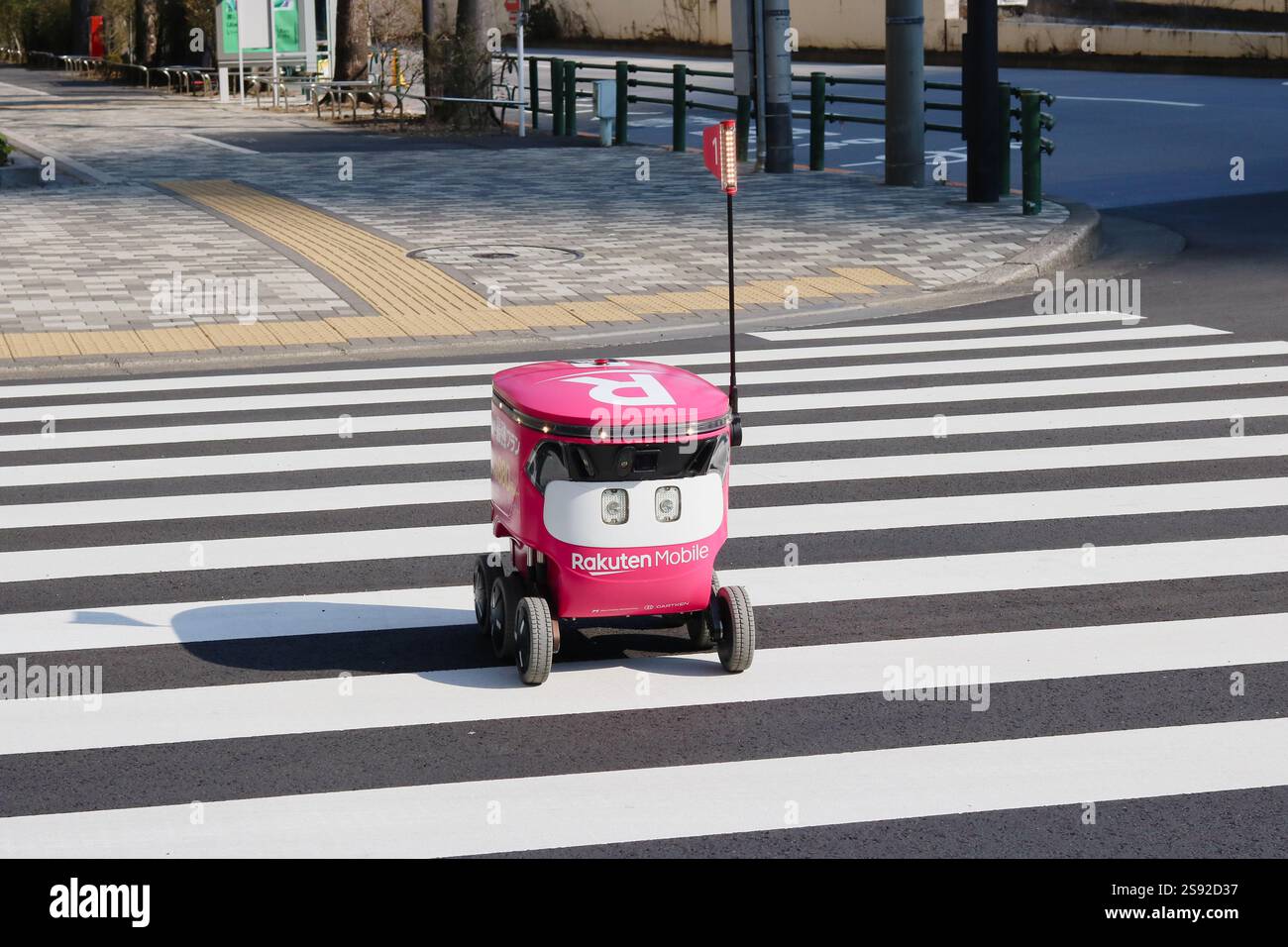 TOKYO, JAPAN - January 24, 2025: A Rakuten delivery robot using a ...