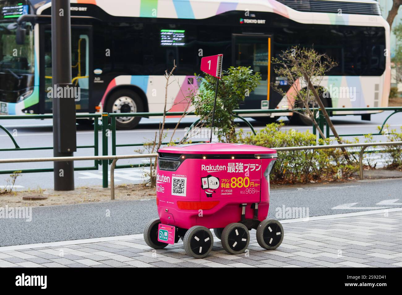 TOKYO, JAPAN - January 24, 2025: A Rakuten delivery robot on a sidewalk ...