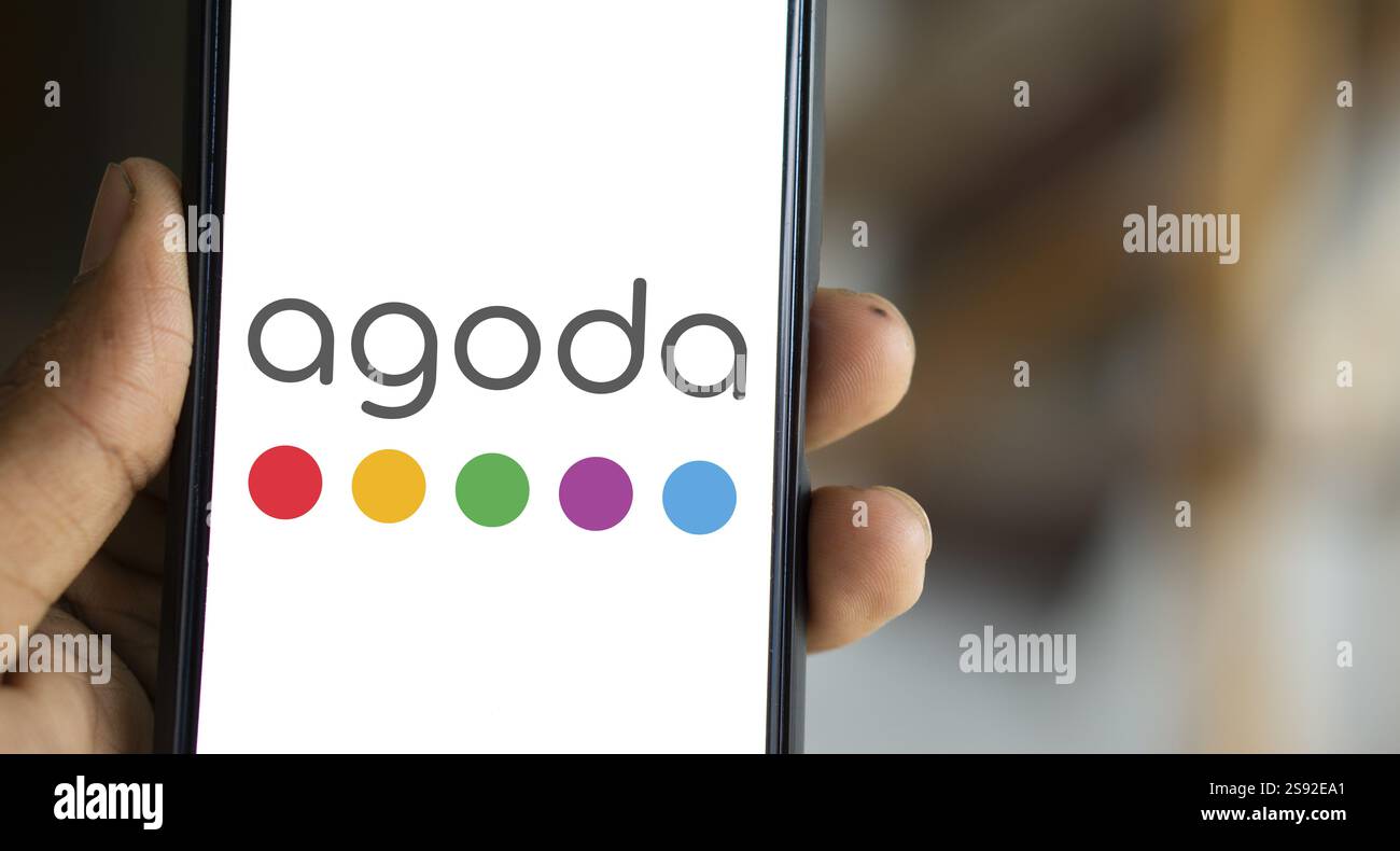 Dhaka, Bangladesh- 21 jan 2025: Agoda logo is displayed on smartphone. Agoda is an online travel ...