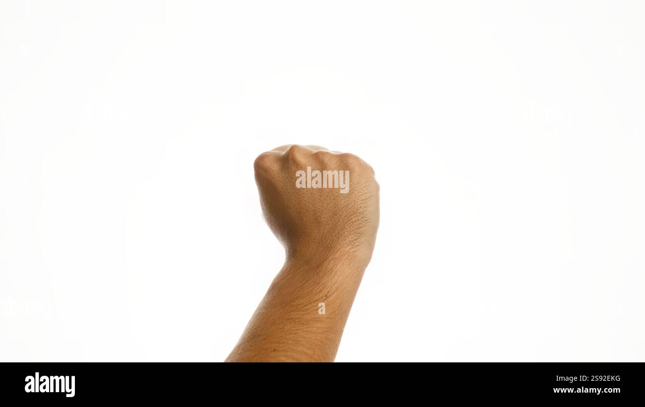 Man's hand making a fist isolated on white background showing strong ...