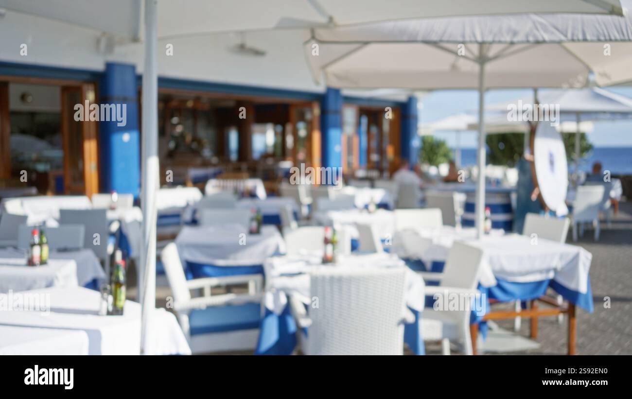 Defocused outdoor restaurant scene in lanzarote spain with blurred ...