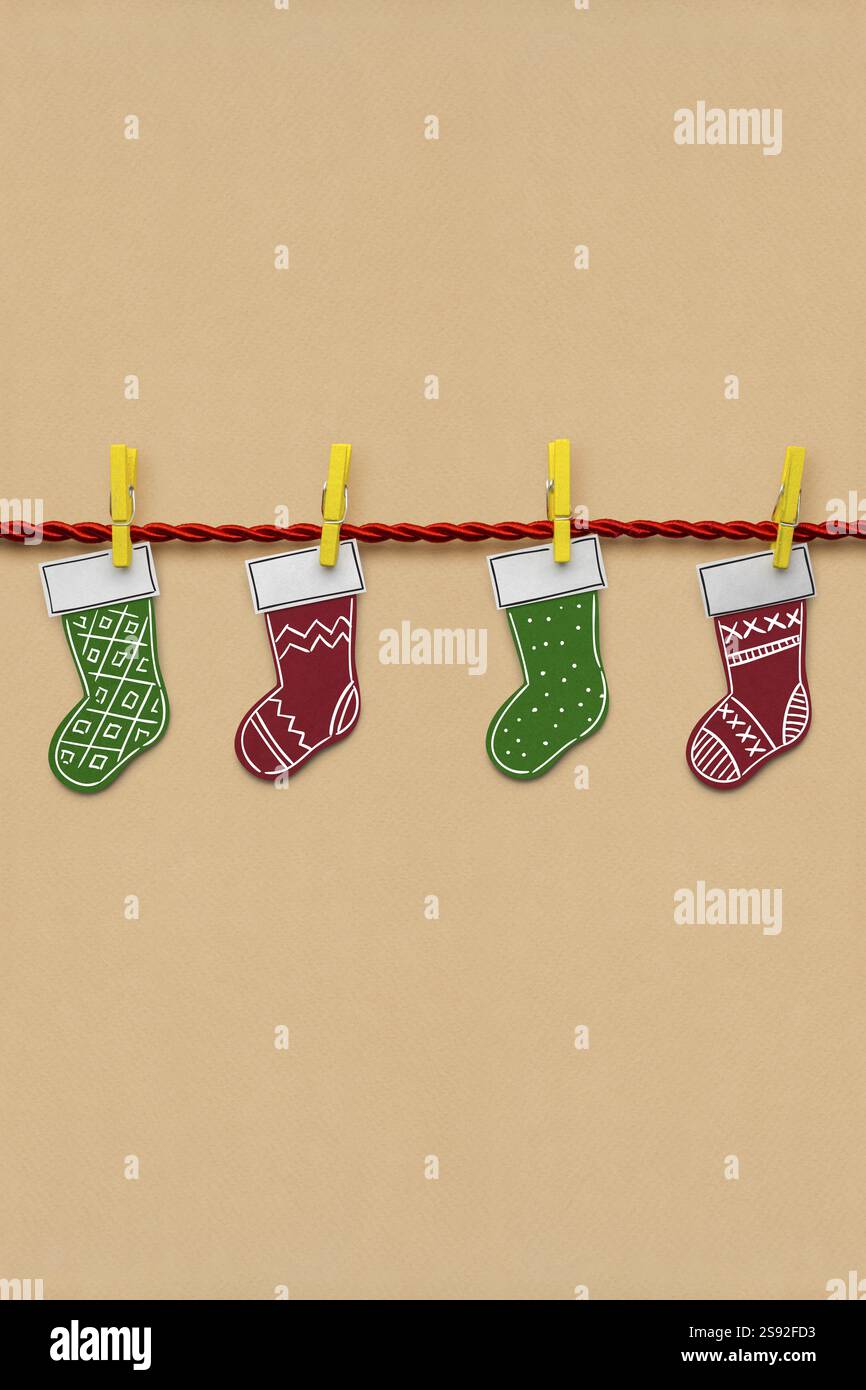 Creative photo of paper Christmas socks on a brown background Stock ...