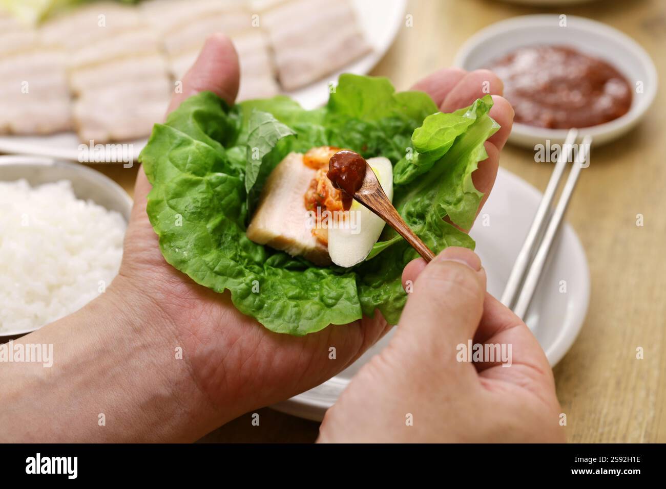 Bossam (sliced boiled pork belly wrapped with leaf vegetables ), Korean ...