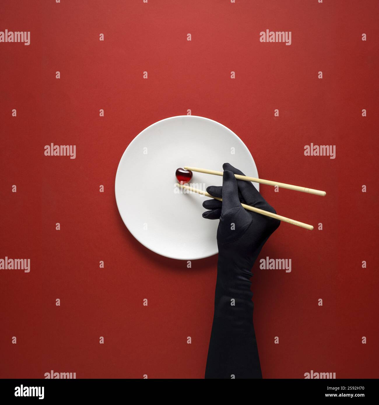 Creative concept photo of kitchenware with hand, painted plate with ...