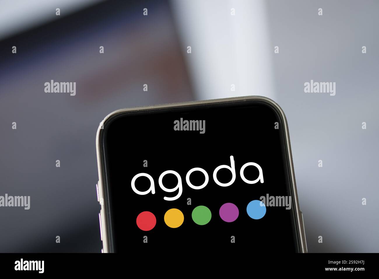 Dhaka, Bangladesh- 21 jan 2025: Agoda logo is displayed on smartphone. Agoda is an online travel ...