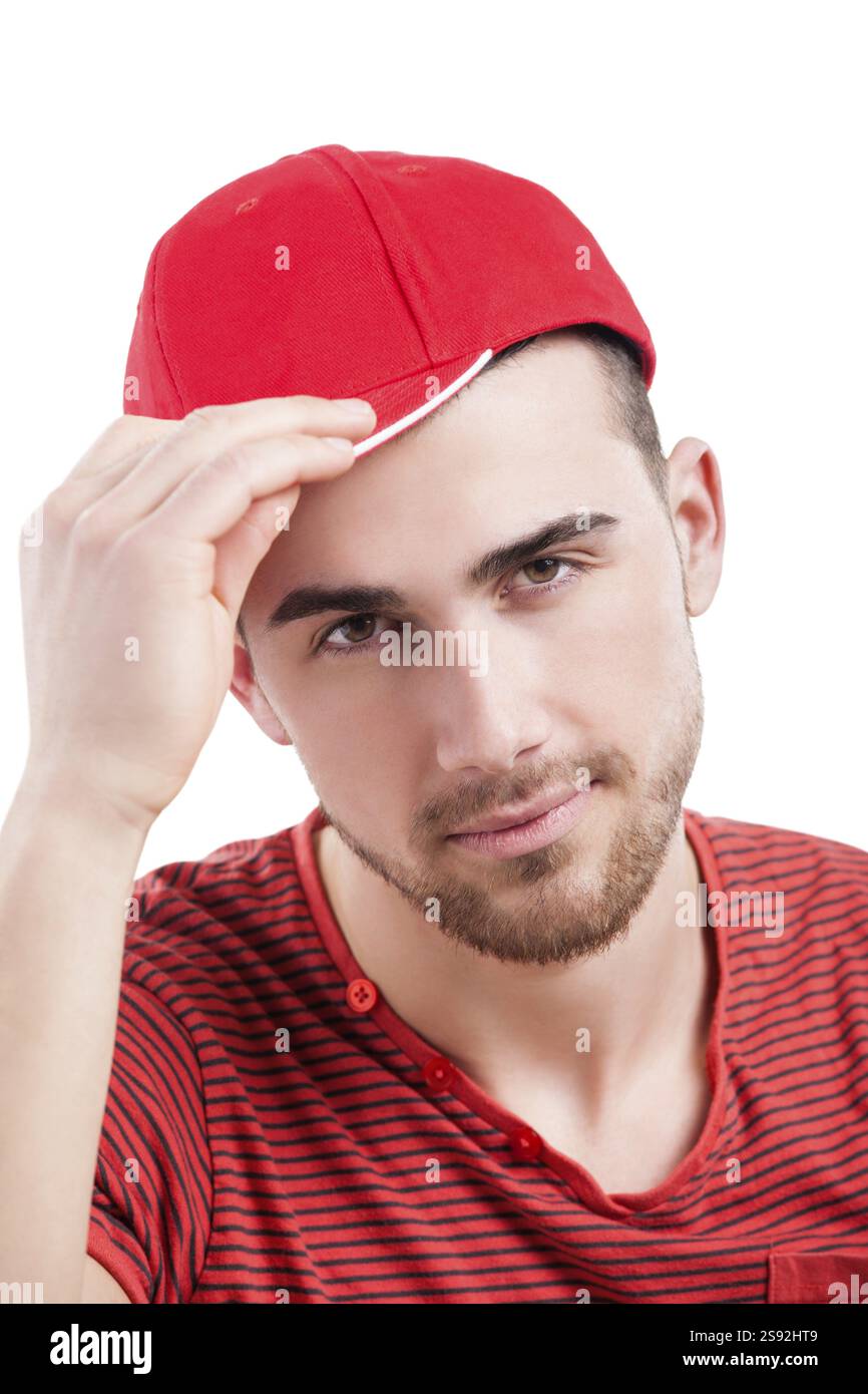 Baseball cap arms folded smiling hi-res stock photography and images ...