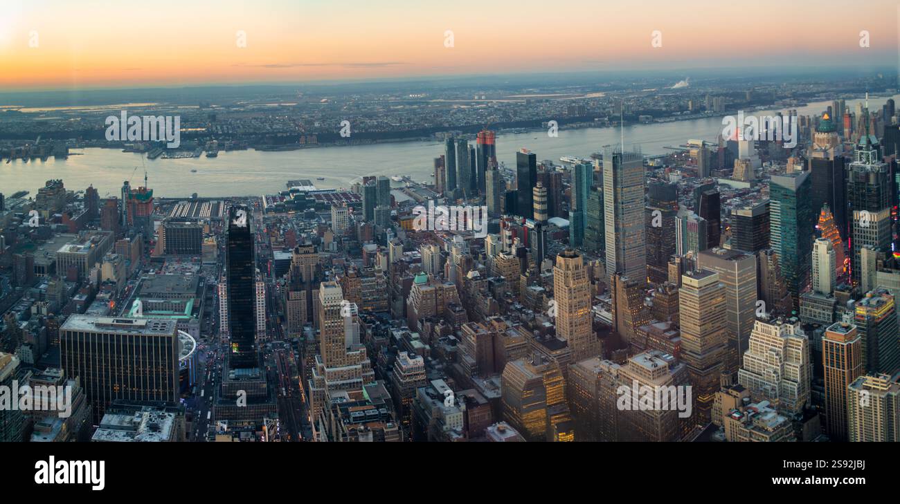 Manhattan skyscrapers high rise buildings in Midtown Manhattan and the East River, aerial view ...