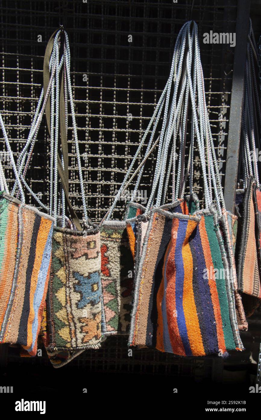 Traditional style handmade woven bags made of fabric Stock Photo - Alamy