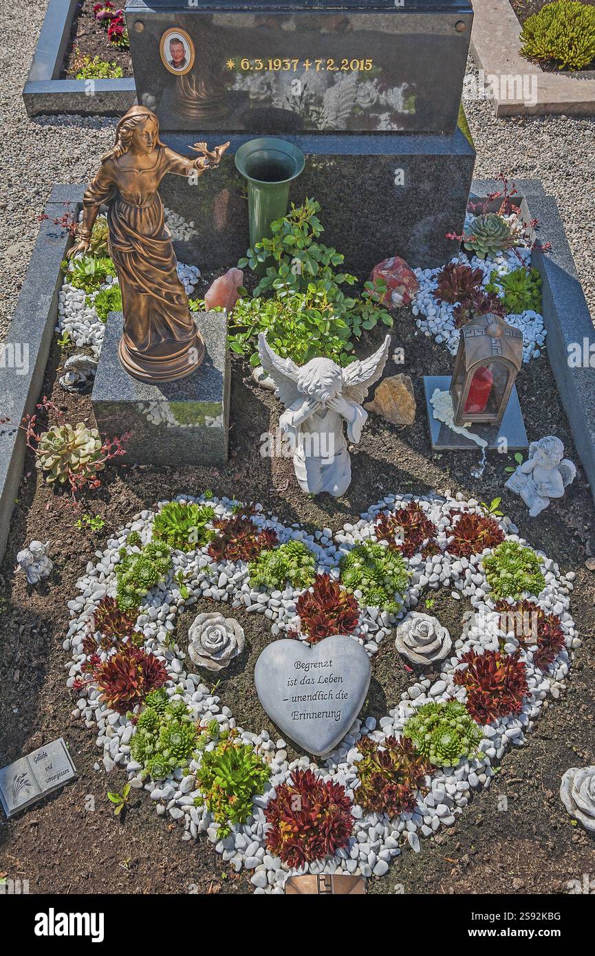 Grave with cherub, angel, grave light at the cemetery church of St ...