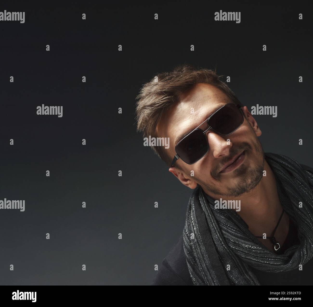 Portrait of a handsome man wearing sunglasses, unobtrusive image Stock ...