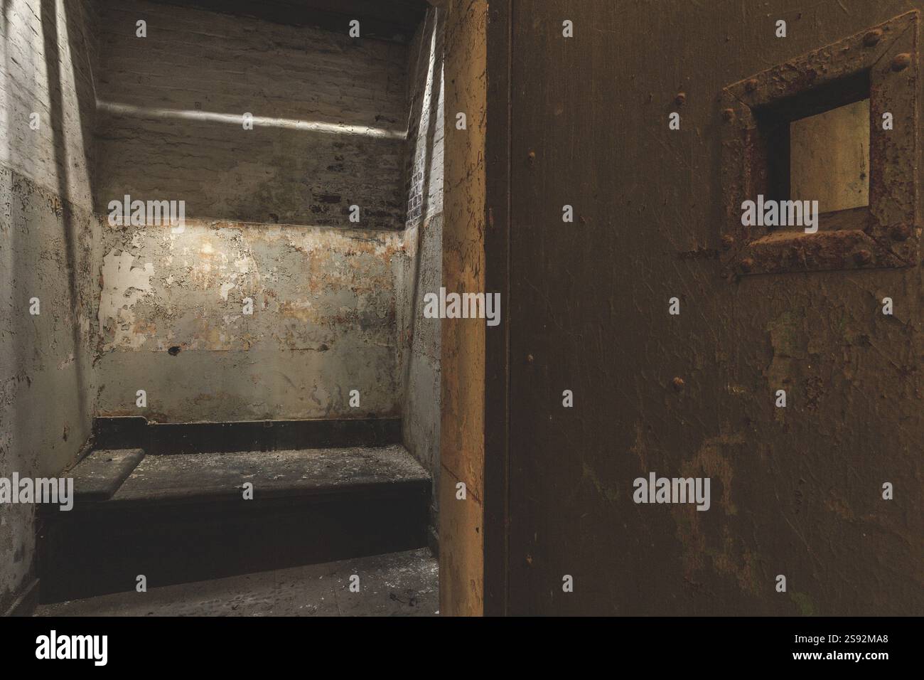 Minimalist staircase with weathered walls and subdued lighting, Prison ...