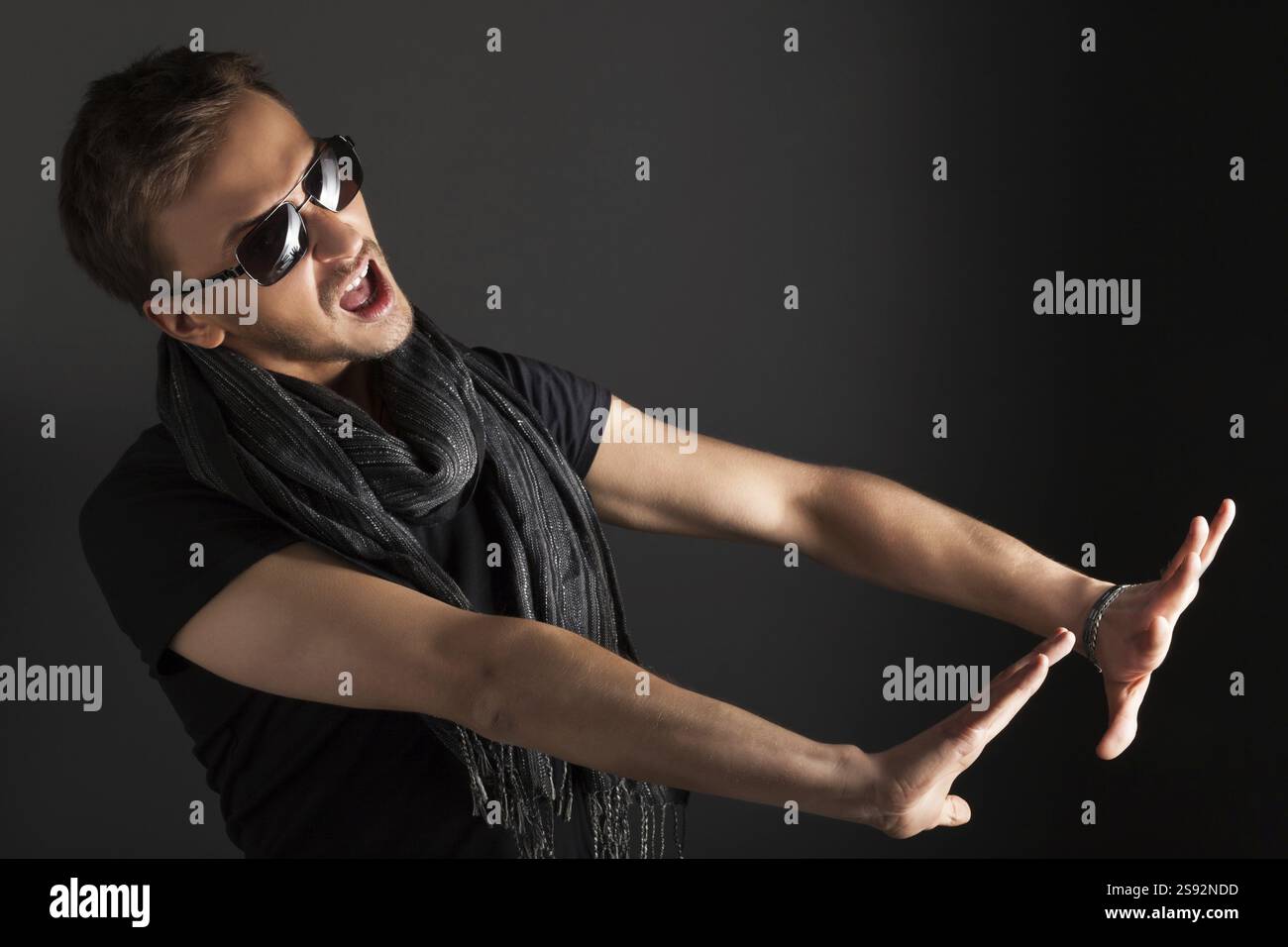 Portrait of a handsome man wearing sunglasses, unobtrusive image Stock ...