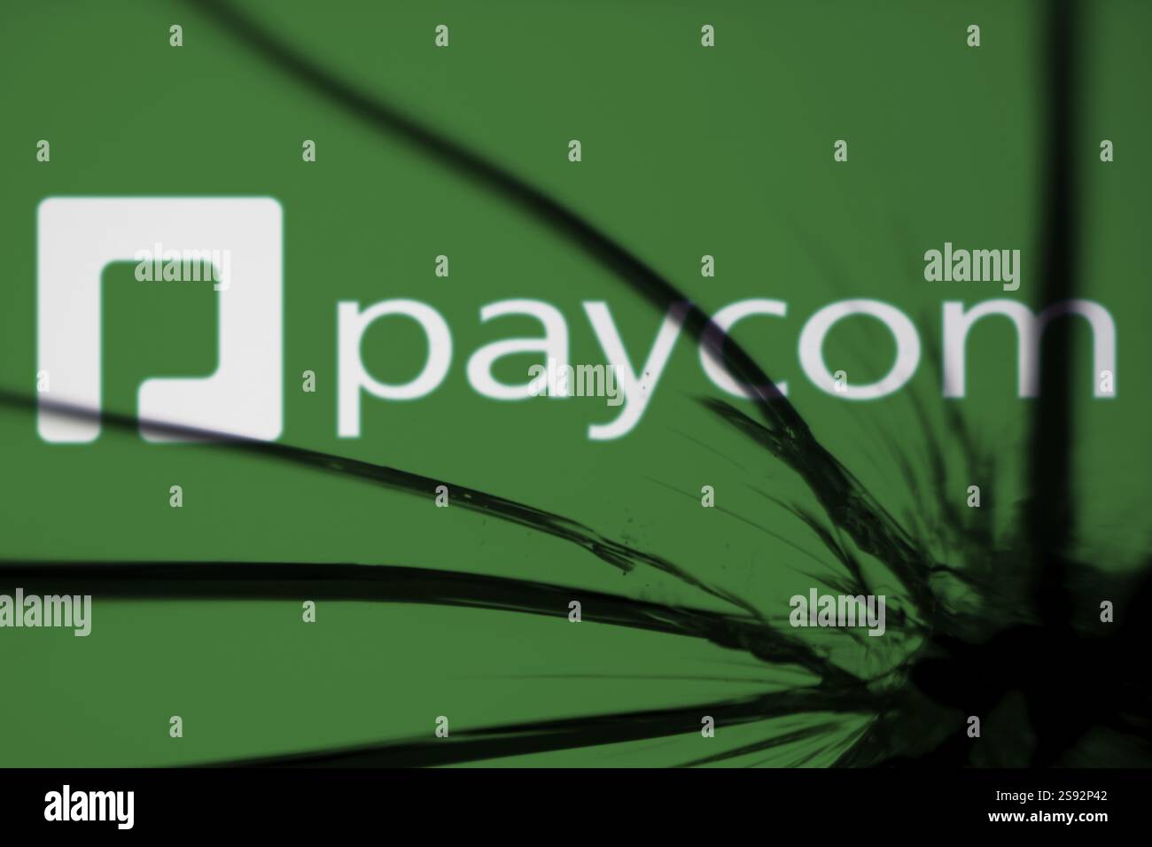 Dhaka, Bangladesh- 19 Jan 2025: paycom logo is visible on the broken ...