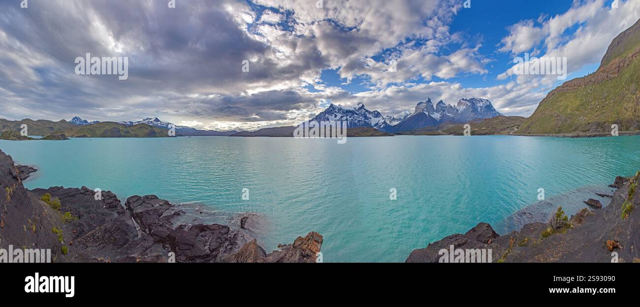 Panoramic view of Lake Pehoe with reflections of dramatic mountains and ...