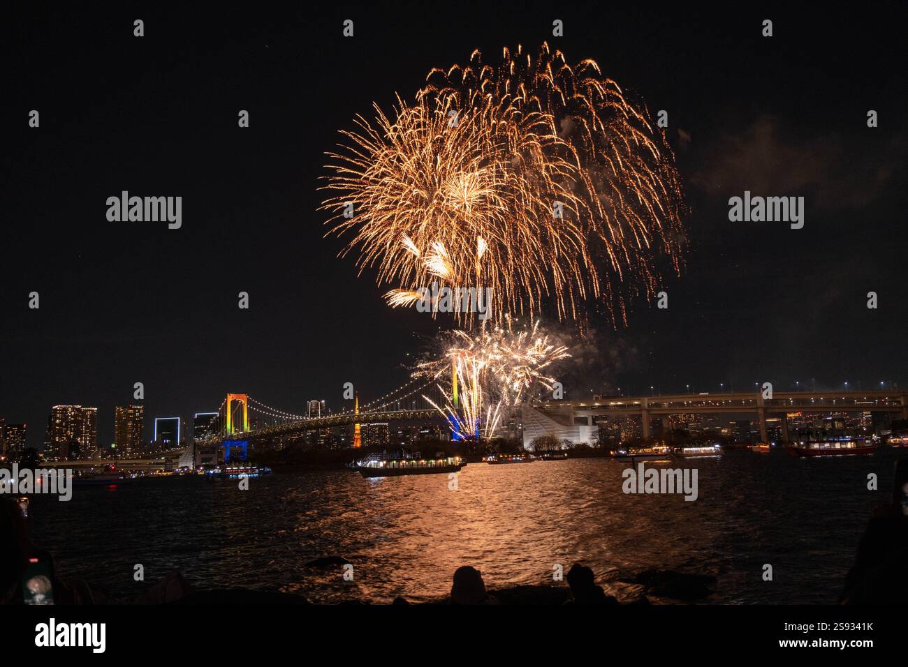 December 21, 2024, Tokyo Bay Fireworks show with Rainbow Bridge in the ...