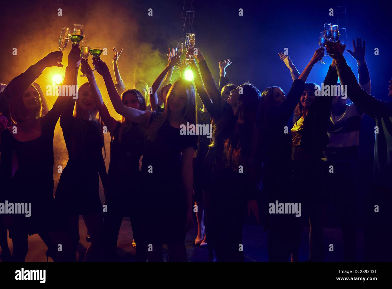 Holidays celebration. Young people attending nightclub, party ...