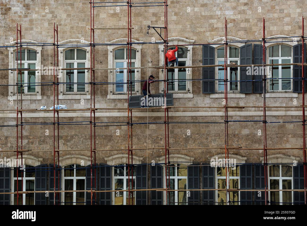 January 24, 2025, Beirut, Beirut, Lebanon: Construction workers stand ...