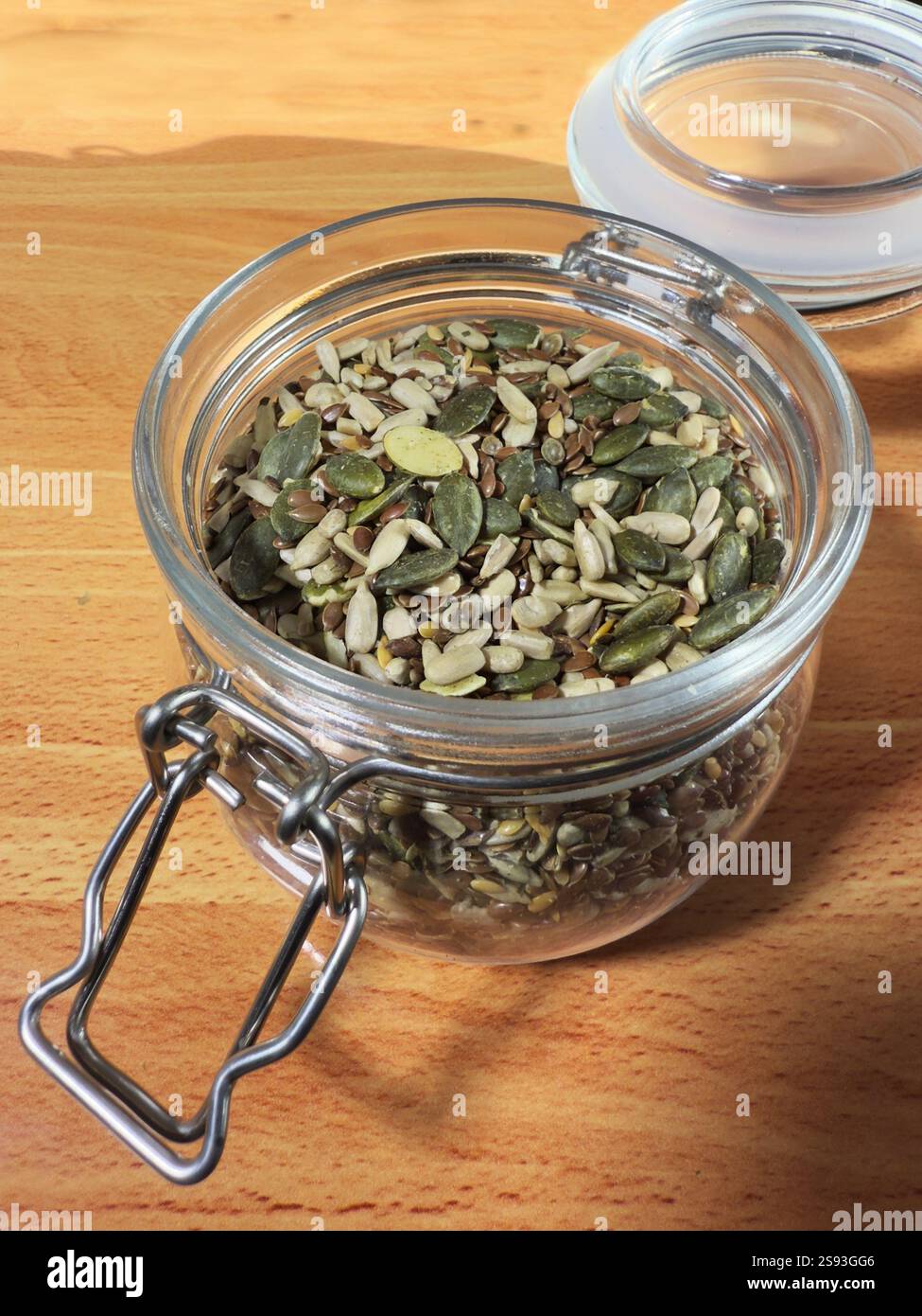 Closeup of mixed edible seeds (sunflower, pumpkin, hemp and linseed) in ...
