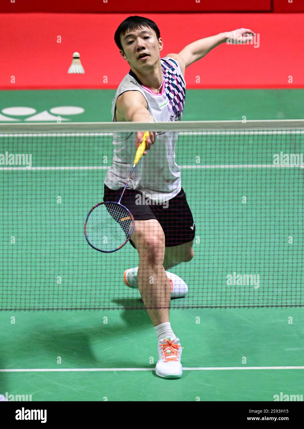 (250124) -- JAKARTA, Jan. 24, 2025 (Xinhua) -- Wang Tzu Wei hits a return during the men's ...