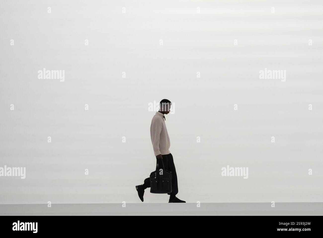 A model wears a creation as part of the men's Dior Homme Fall-Winter ...