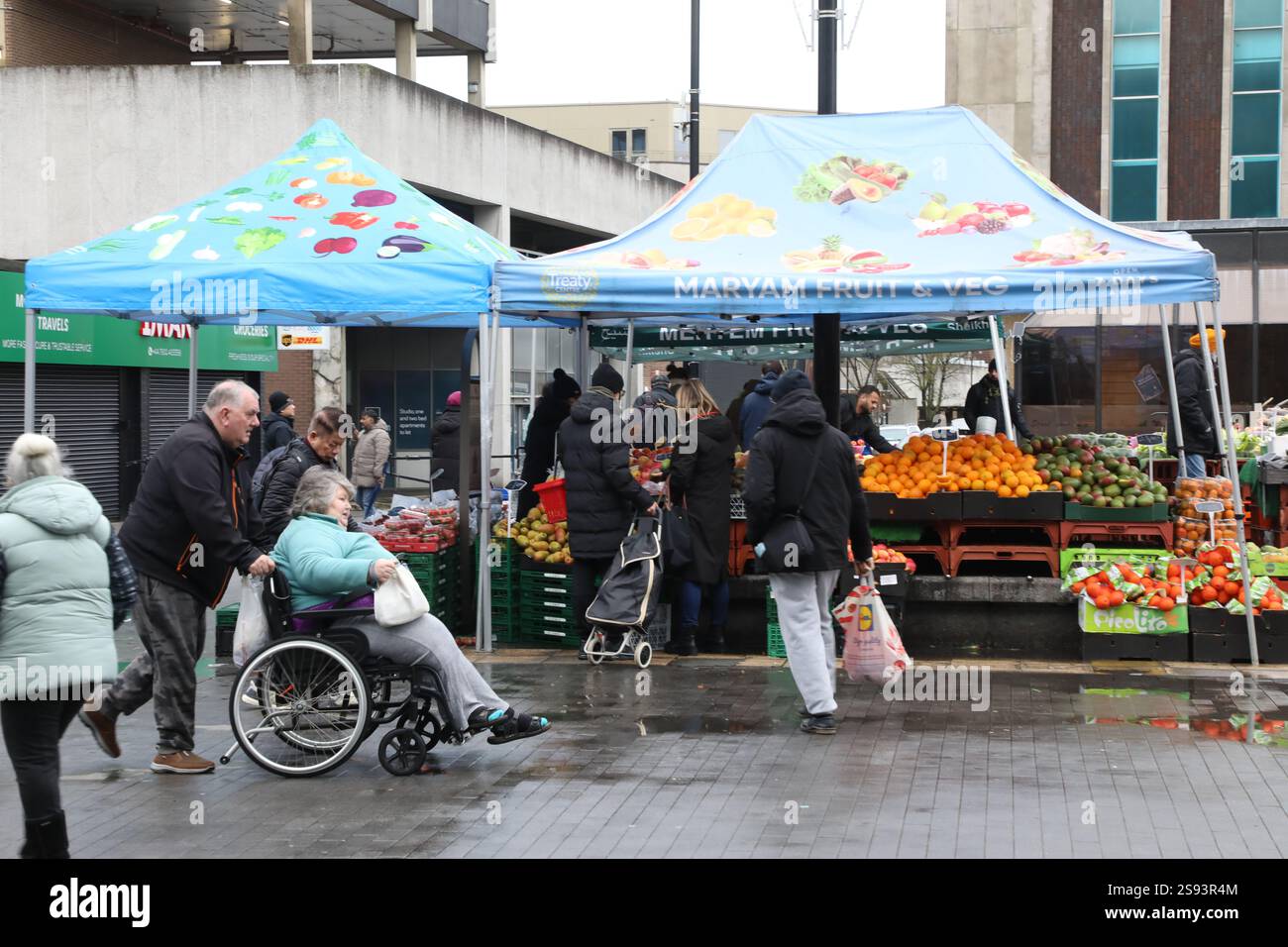 greengrocer, market stalls on High street, Hounslow, London, England ...