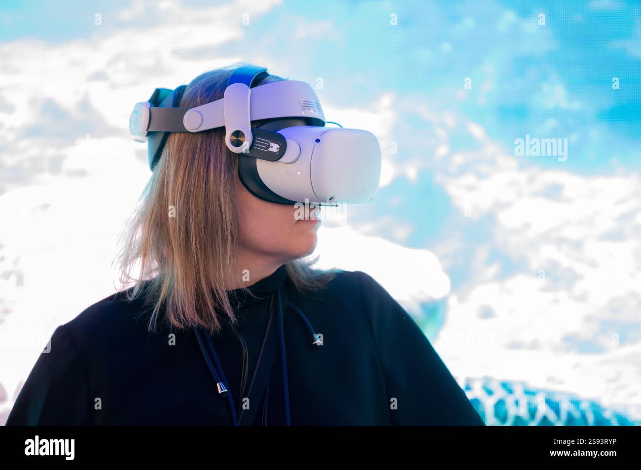 A woman with virtual reality glasses during the FITUR International ...