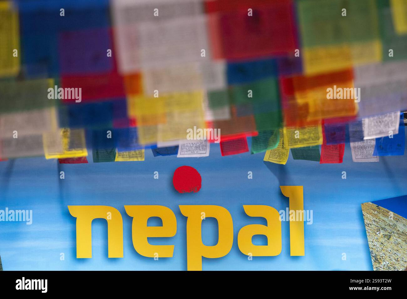 Tibetan prayer flags at the stand of Nepal in the FITUR International ...