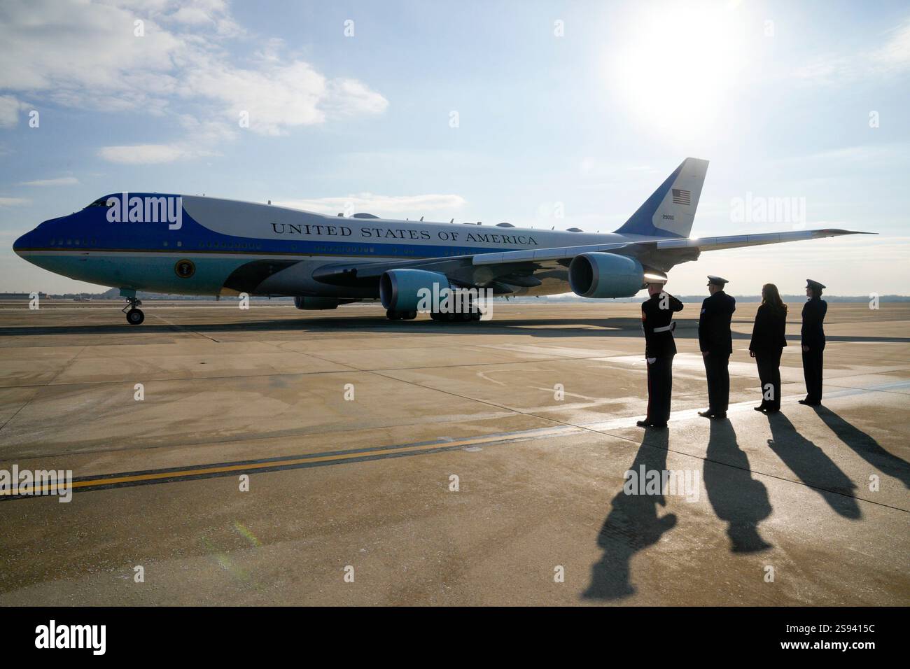 Two officers, alongside Protocol Specialist Christine Flessner and Col ...