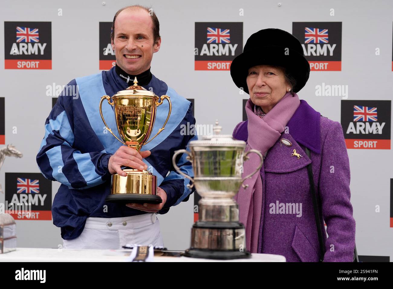 The Princess Royal (right) presents Jockey Douglas White with the ...