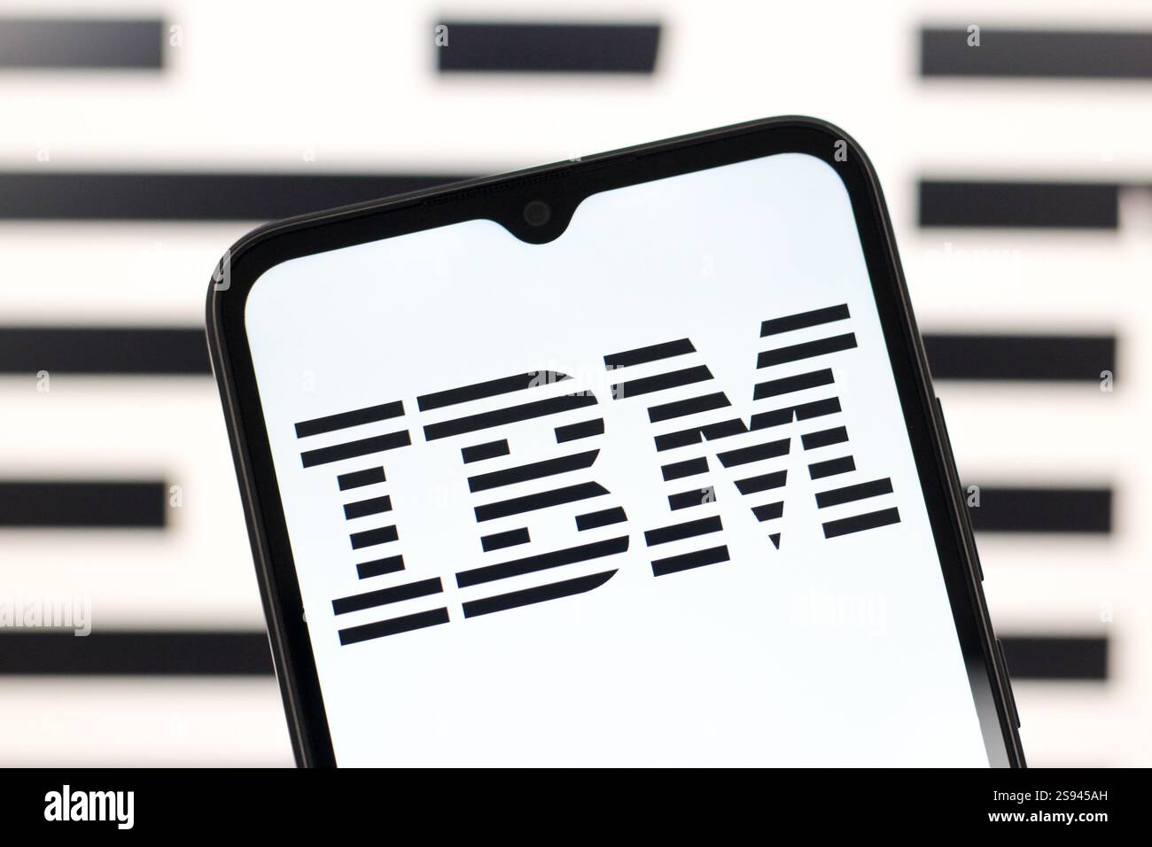 In this photo illustration, the International Business Machines ...