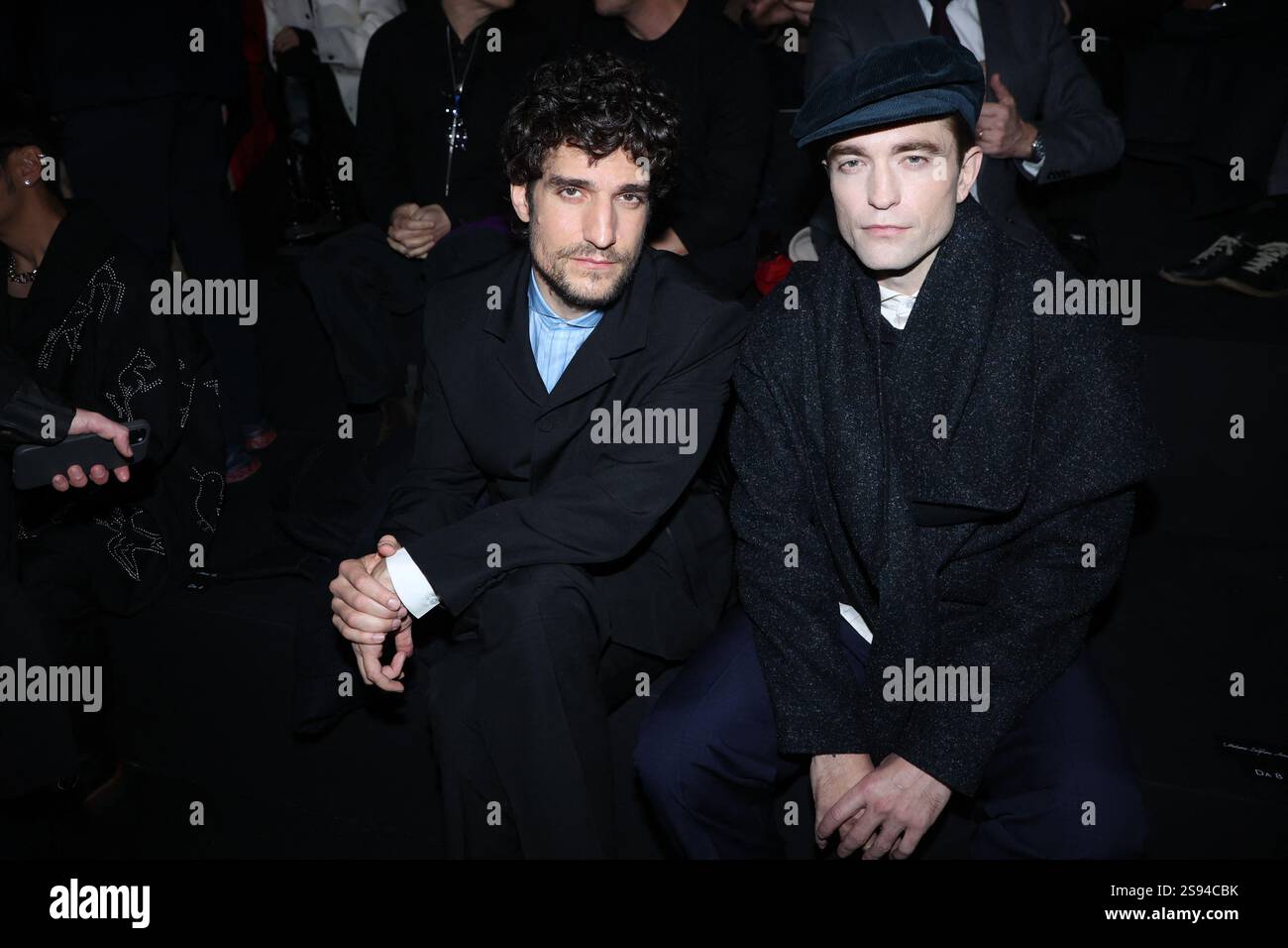 Louis Garrel and Robert Pattinson attending the Dior Menswear Fall ...