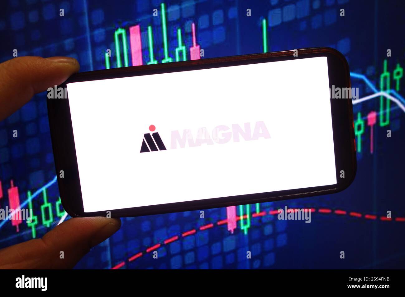 In this photo illustration, the Magna International company logo is ...