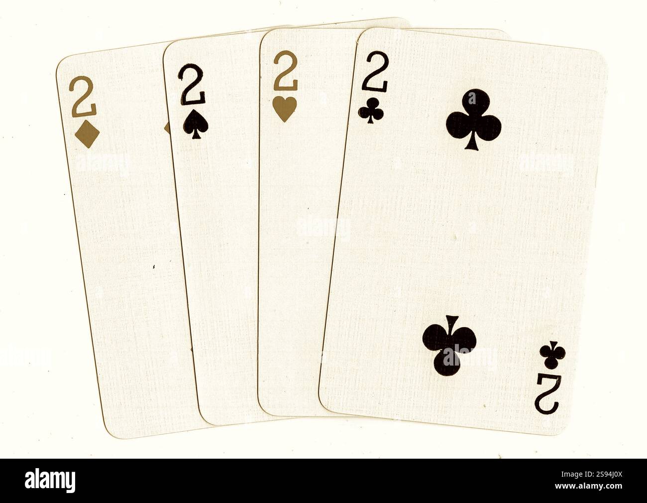 Vintage playing cards showing four of the same value in sepia isolated ...