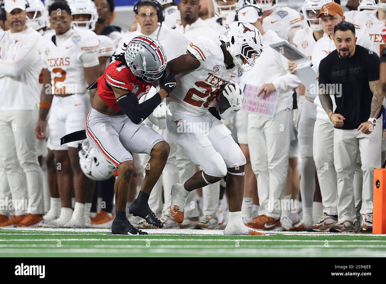 Ohio State cornerback Davison Igbinosun (1) tackles Texas running back ...