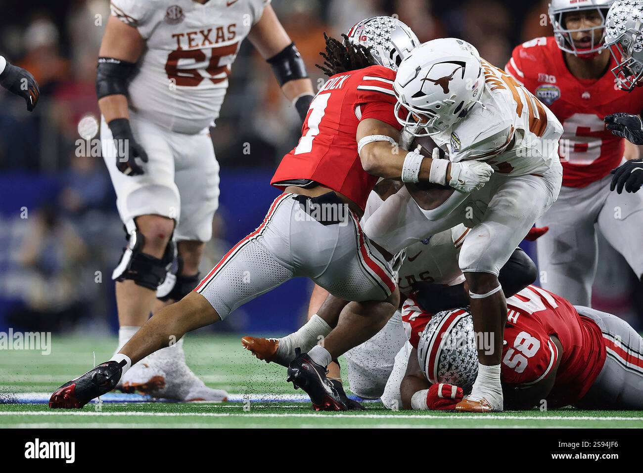 Ohio State cornerback Jordan Hancock (7) tackles Texas running back ...