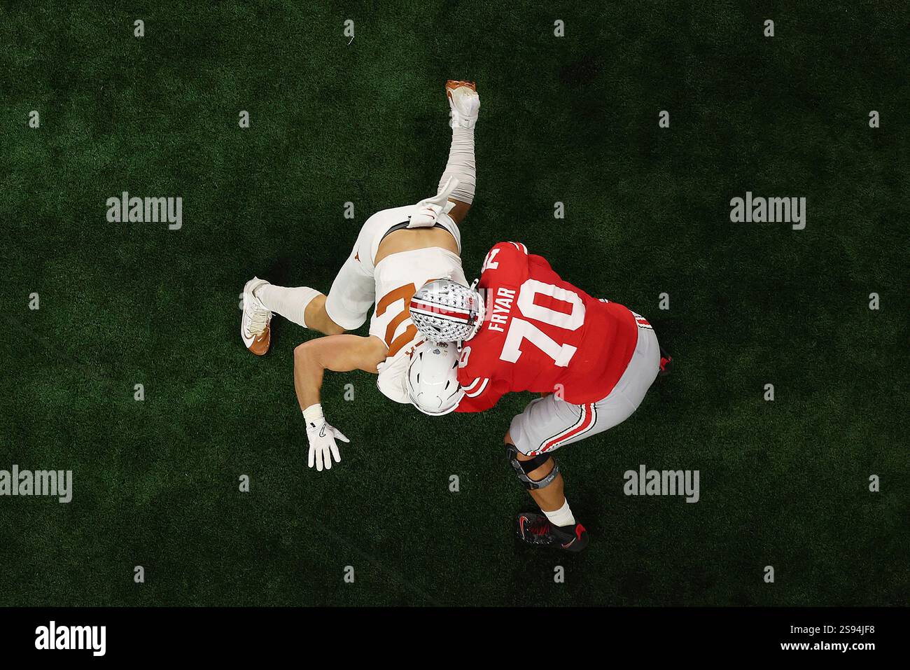 Ohio State offensive tackle Josh Fryar (70) blocks Texas defensive end ...