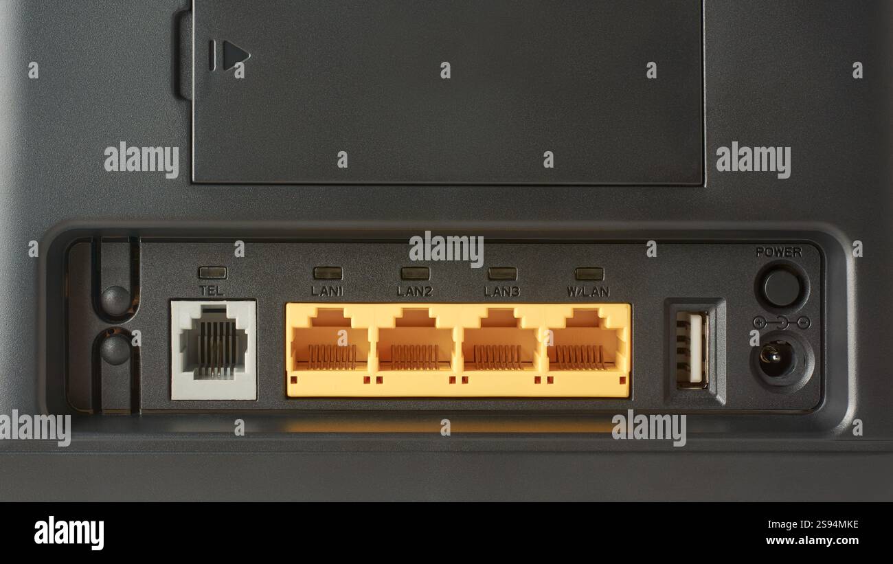 ports and connections of back of black internet router, telephone ...
