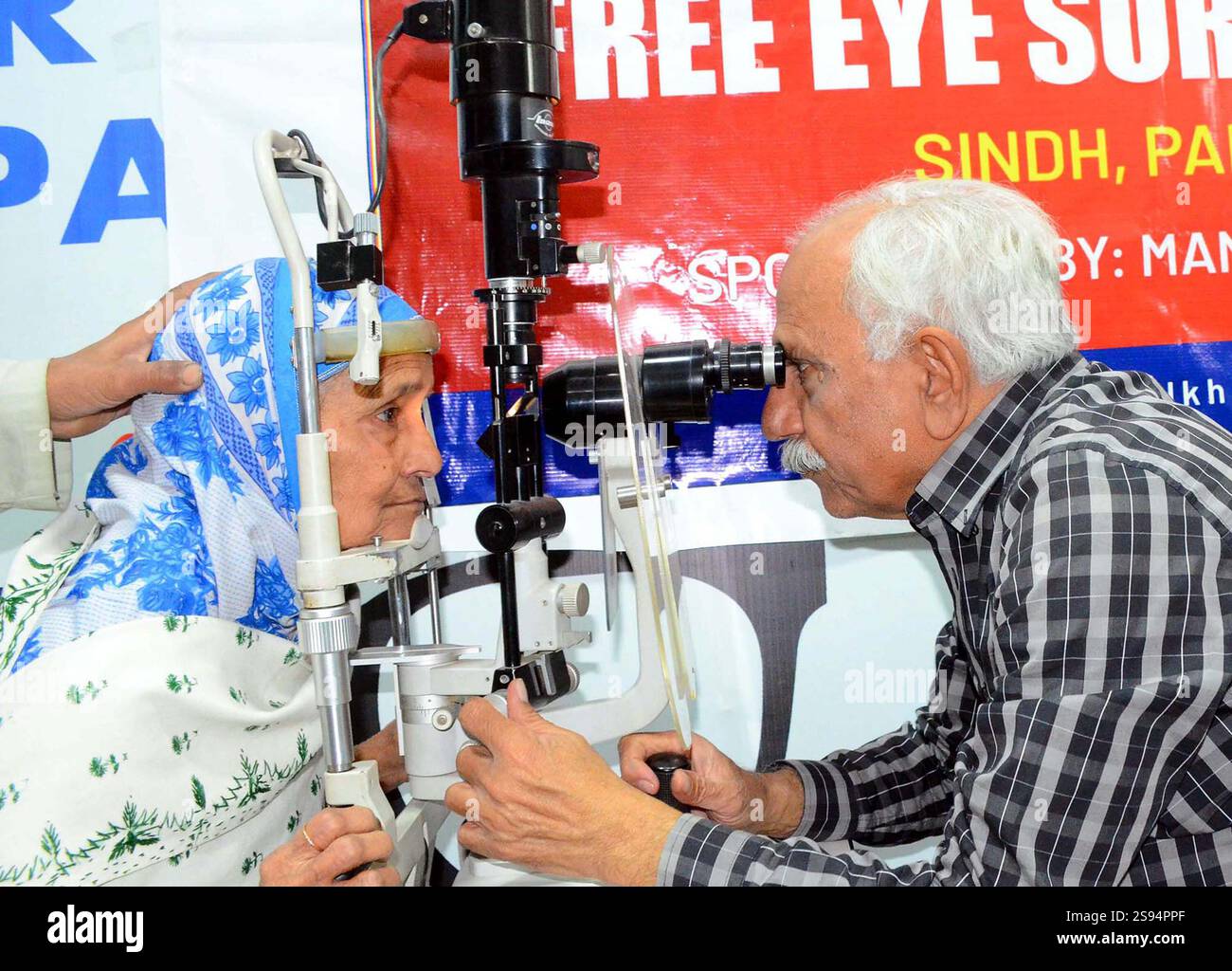 Patients are being examine by doctors during the free eye surgeries ...