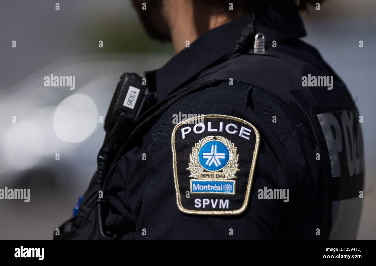 An SPVM police shoulder patch is seen on an officer in Montreal ...