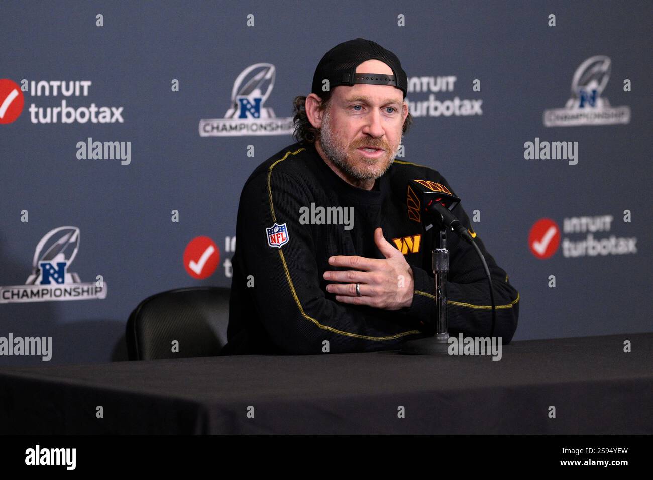 Washington Commanders special teams coordinator Larry Izzo speaks to ...