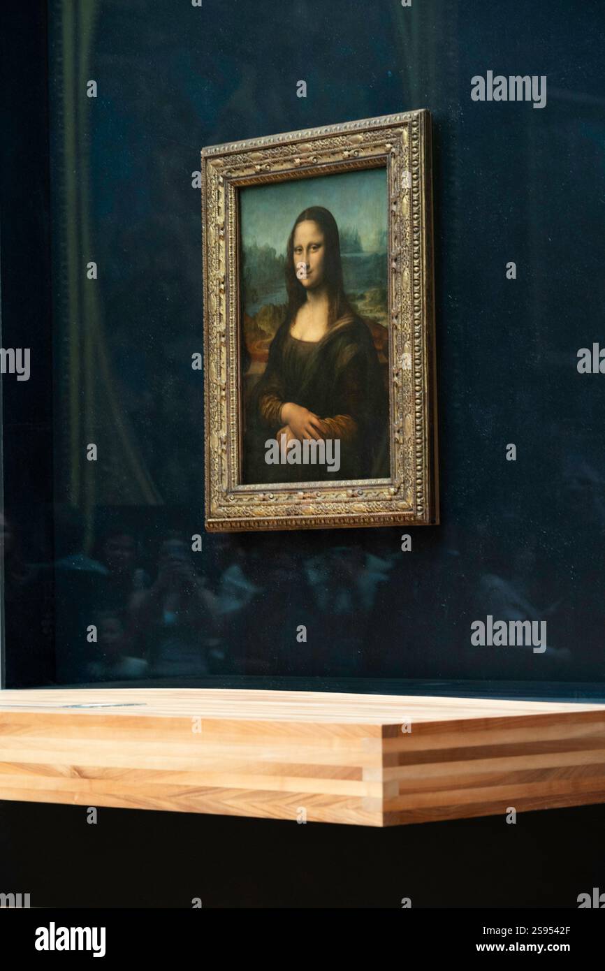 Mona Lisa framed art at the Louvre Museum, Paris, France Stock Photo ...
