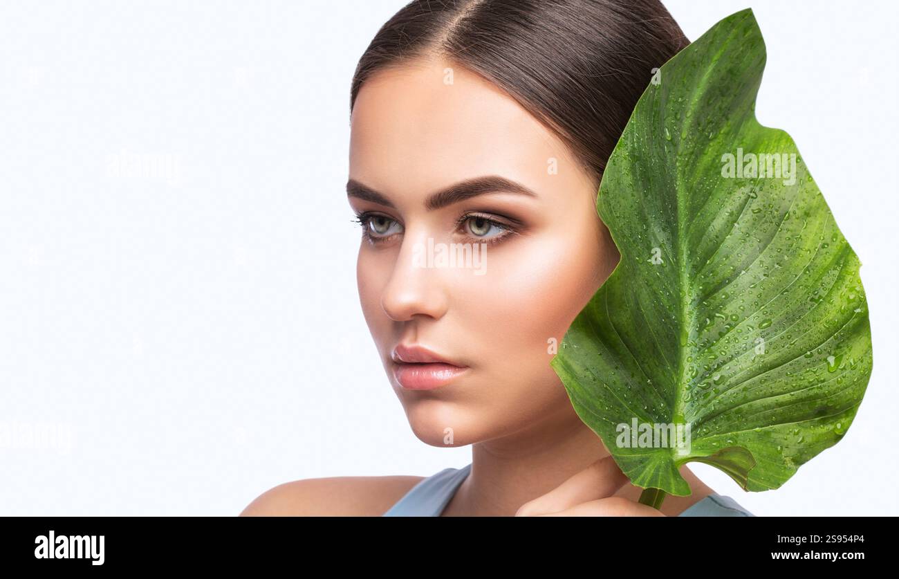 Portrait of attractive girl with healthy clean skin and beautiful make ...